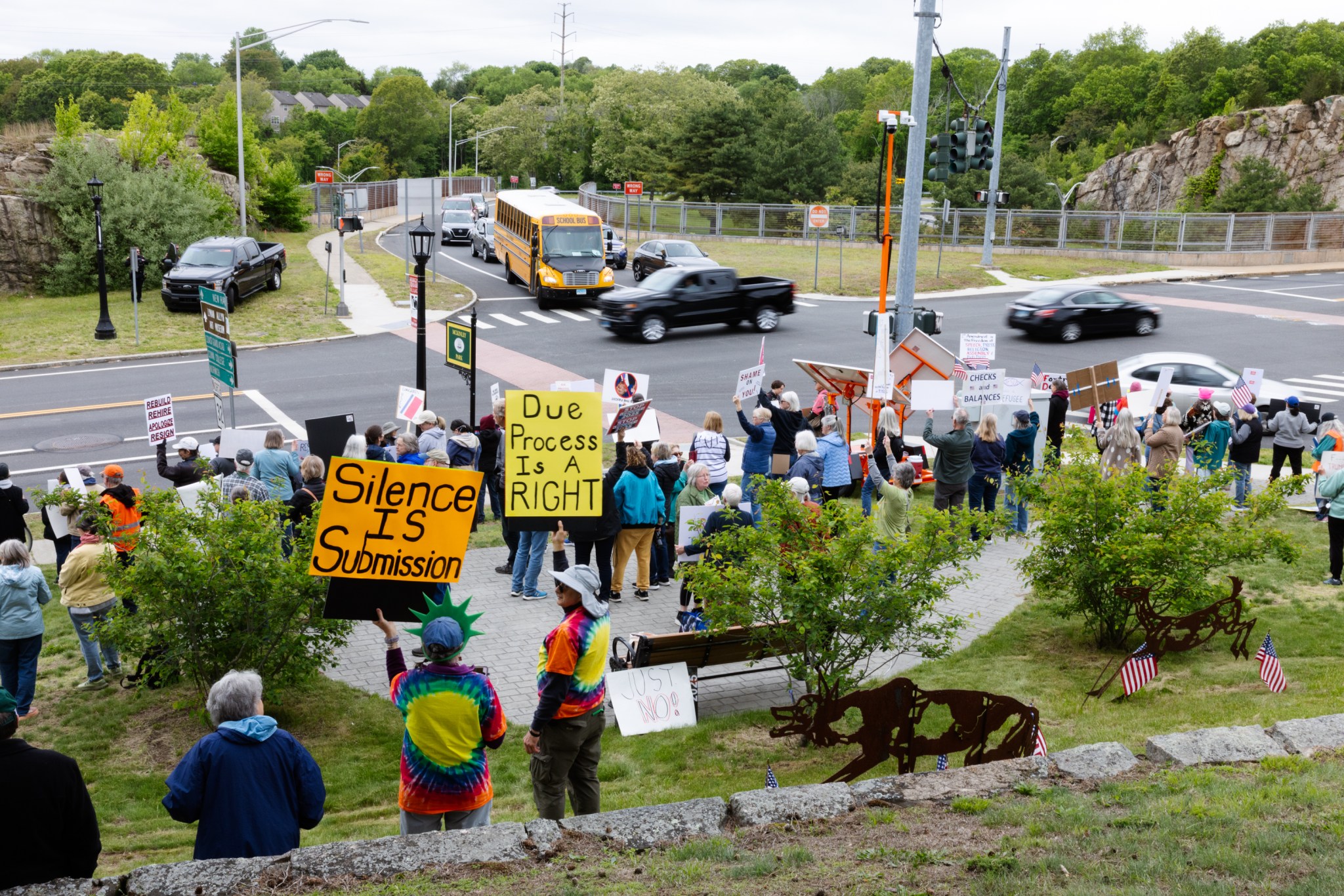 At Coast Guard graduation, Kristi Noem talks as protesters gather