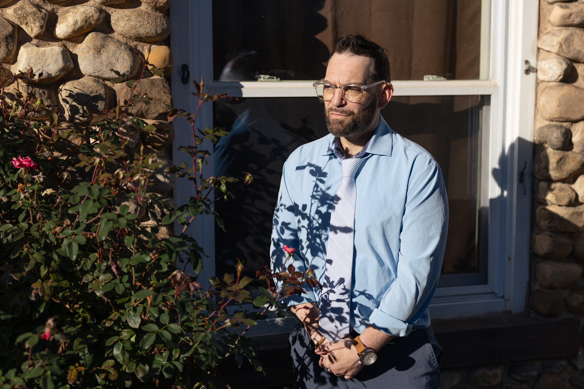 Jason Trelli poses for a portrait in his backyard on October 22, 2025 ...
