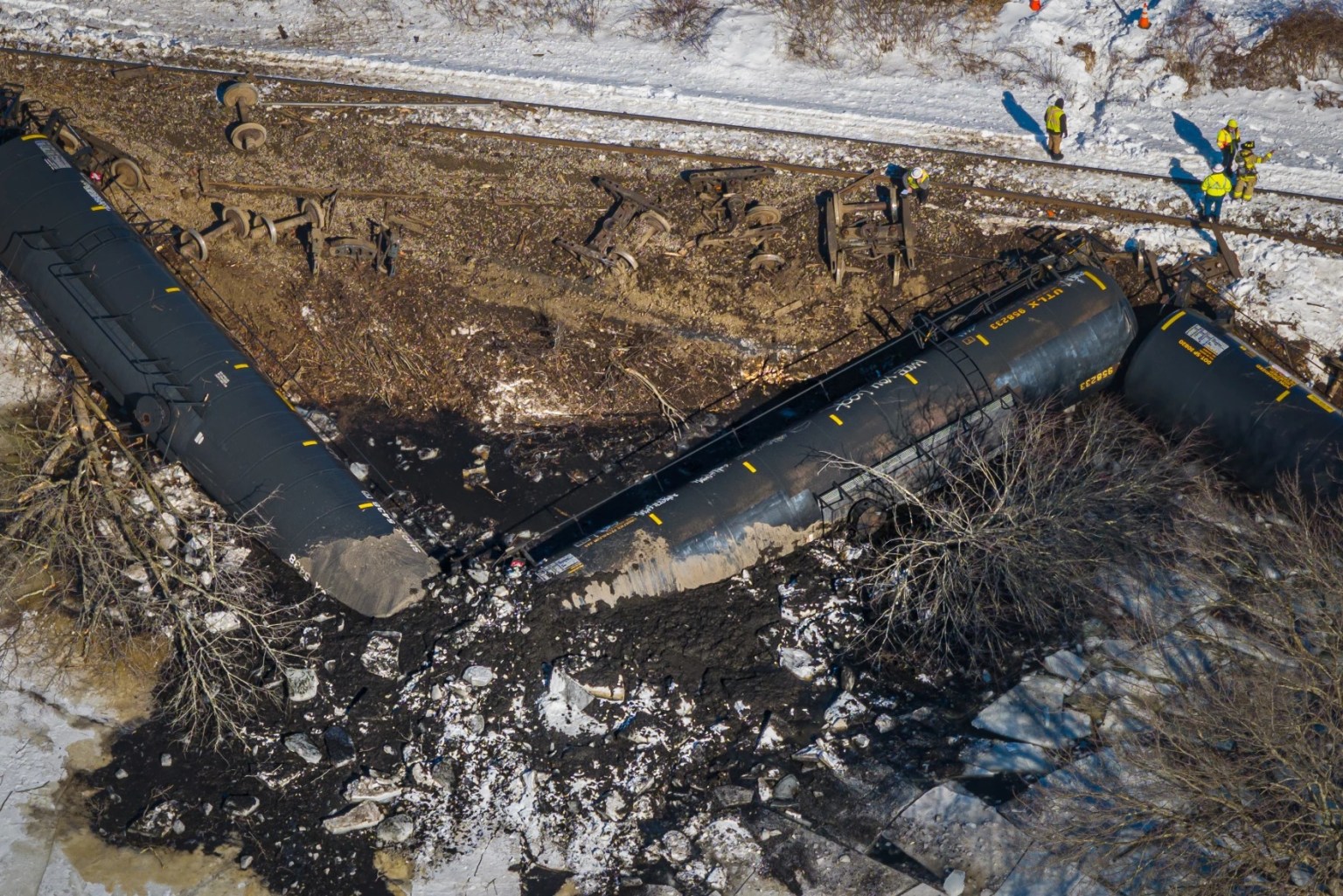 Train derails in Mansfield; cars with liquid propane topple into river
